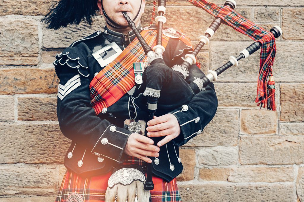 EDINBURGH, SCOTLAND, 24 March 2018 , Scottish bagpiper dressed in ...
